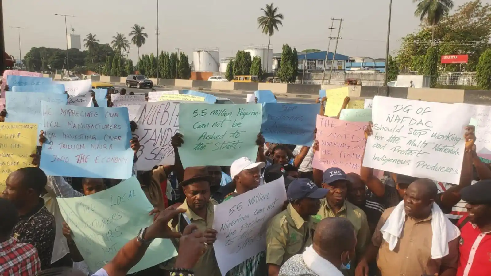 NLC, TUC, others storm NAFDAC office to protest ban on sachet alcohol ...